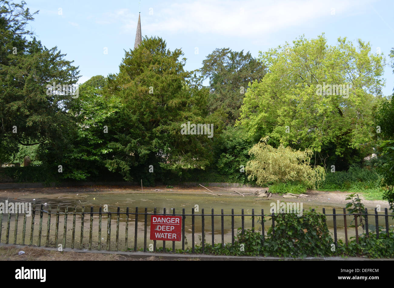 Drought pond in a rural village Stock Photo - Alamy