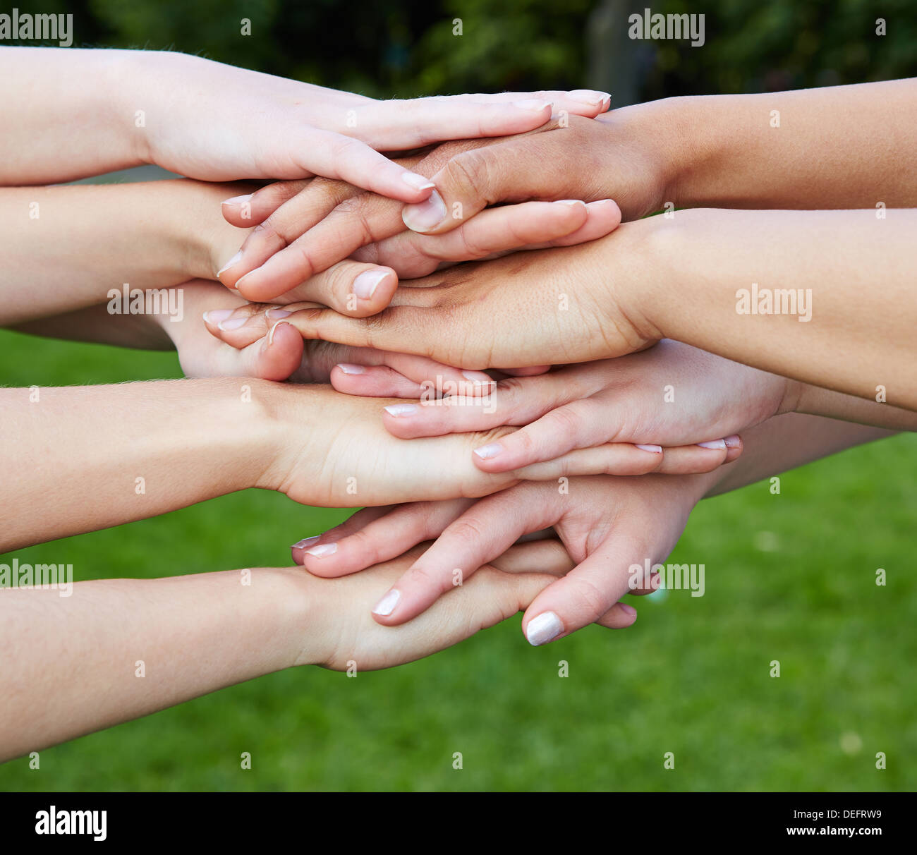 Group of many hands as team motivation concept in nature Stock Photo ...