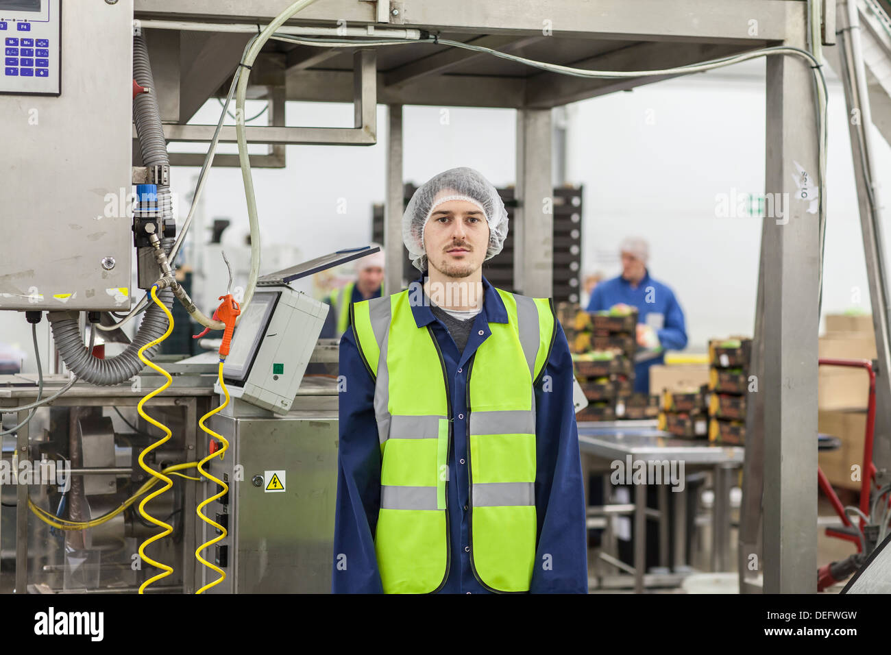 Man Young Business Industry Factory Worker food packing factory uk food ...