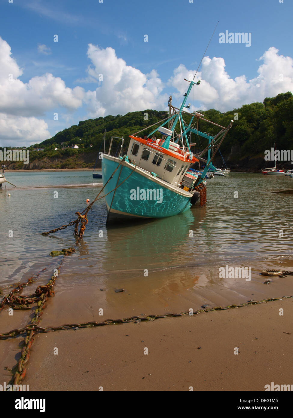 Fishing boat resting in the sand, Cardigan Bay, Wales, UK Stock Photo ...