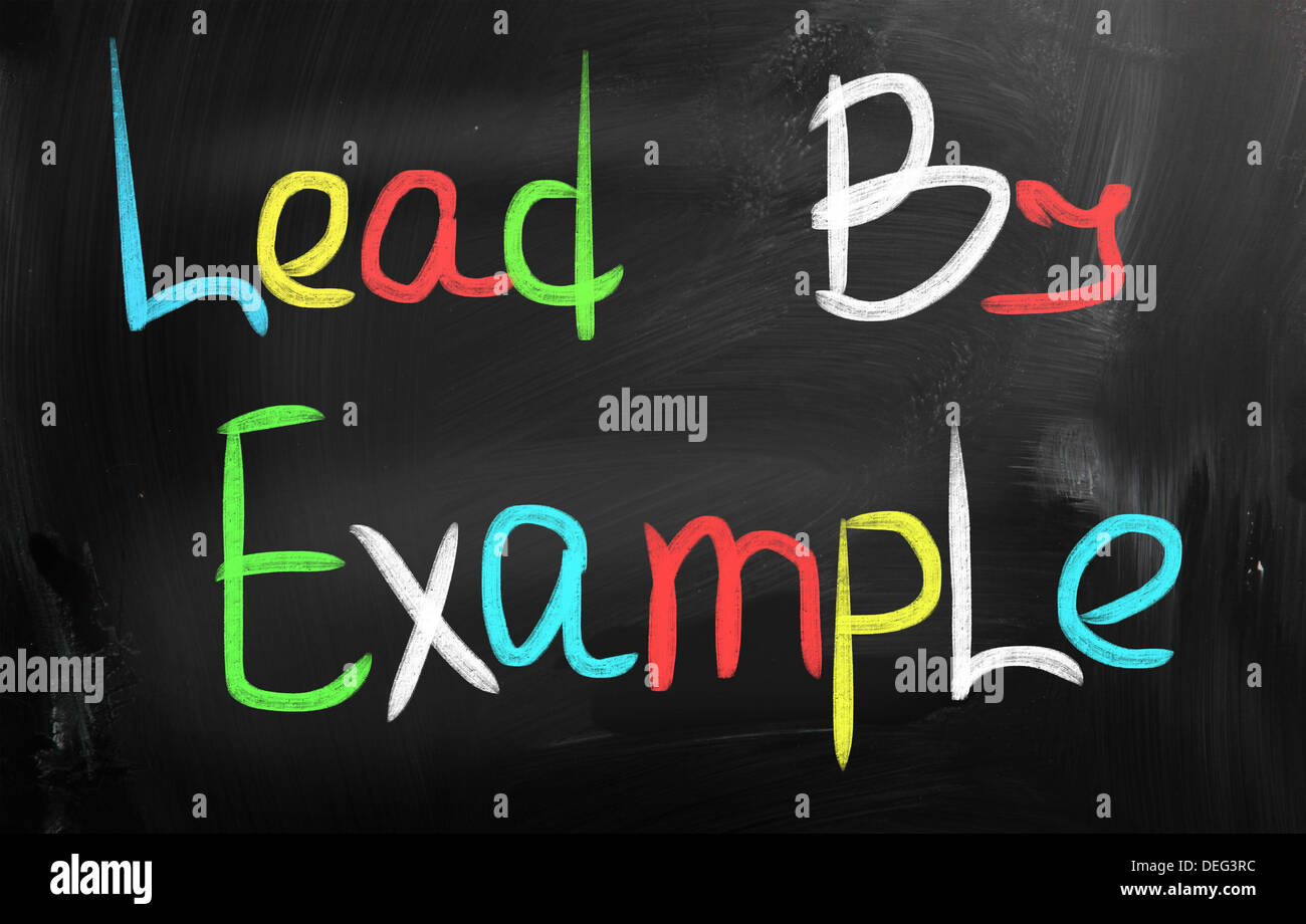 Lead by example handwritten with chalk on a blackboard Stock Photo - Alamy