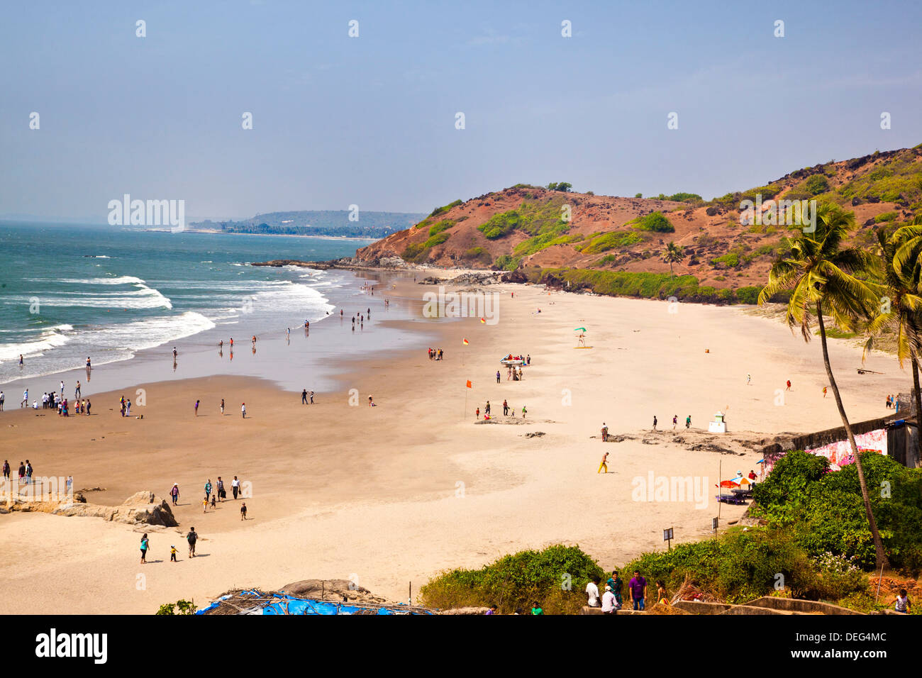 High angle view of tourists on the beach, Vagator, Bardez, North Goa ...