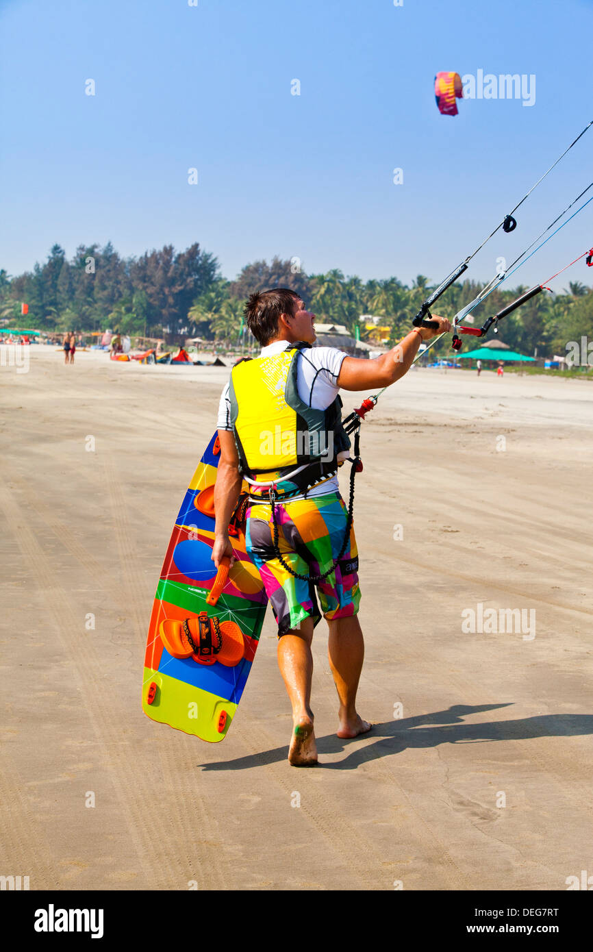 Person enjoying kiteboarding on the beach, Morjim, North Goa, Goa ...