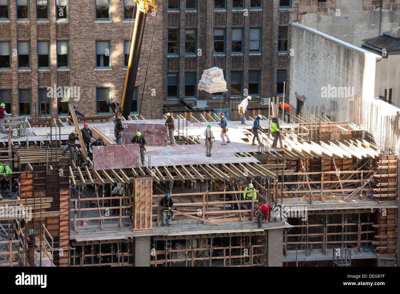 High-rise Building Construction Site with tradesmen (4 of 6 Stock Photo ...