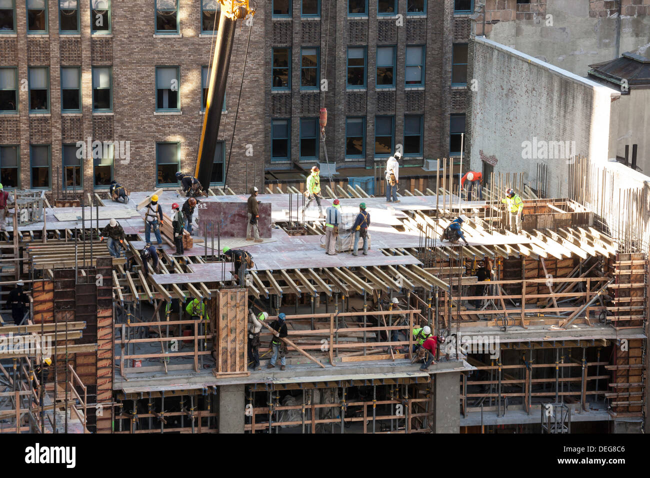 Time lapse construction workers working hi-res stock photography and ...