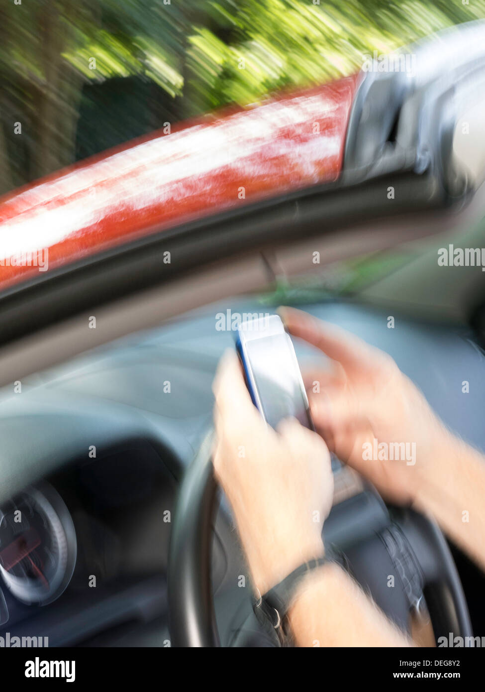 Male Hands Text Messaging While Driving Stock Photo - Alamy