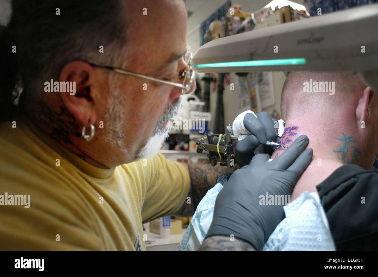 Man tattooing. Florida, USA Stock Photo - Alamy