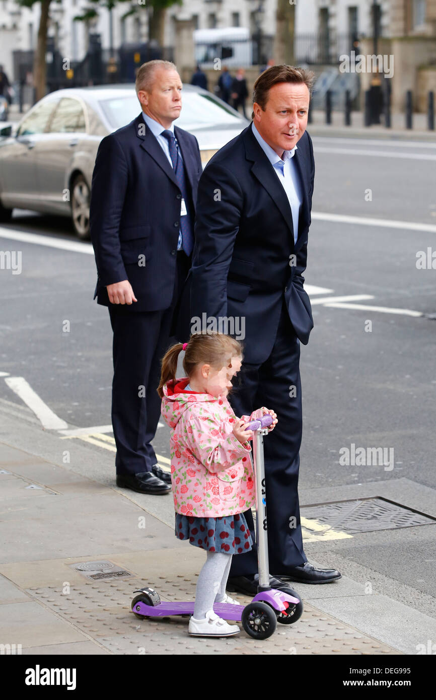 British Prime Minister David Cameron walking his daughter Florence to ...