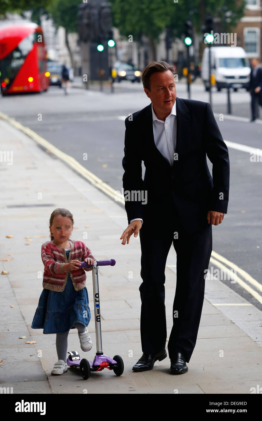 British Prime Minister David Cameron walking his daughter Florence to ...
