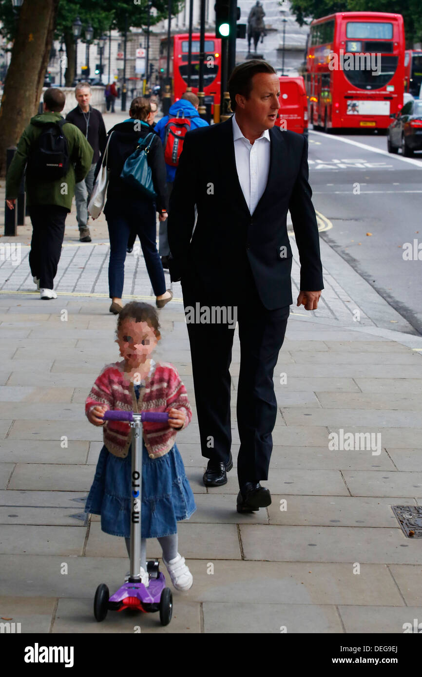 British Prime Minister David Cameron walking his daughter Florence to ...