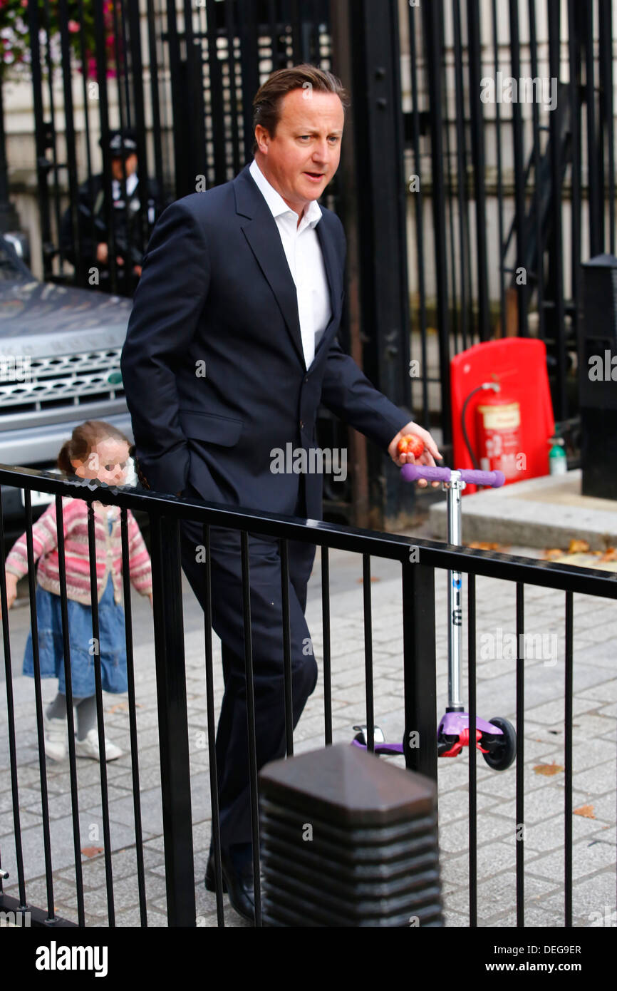 British Prime Minister David Cameron walking his daughter Florence to ...