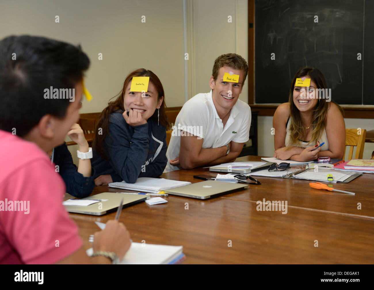 Foreign students playing "Sticky Head Game" in their Idiom class at ...
