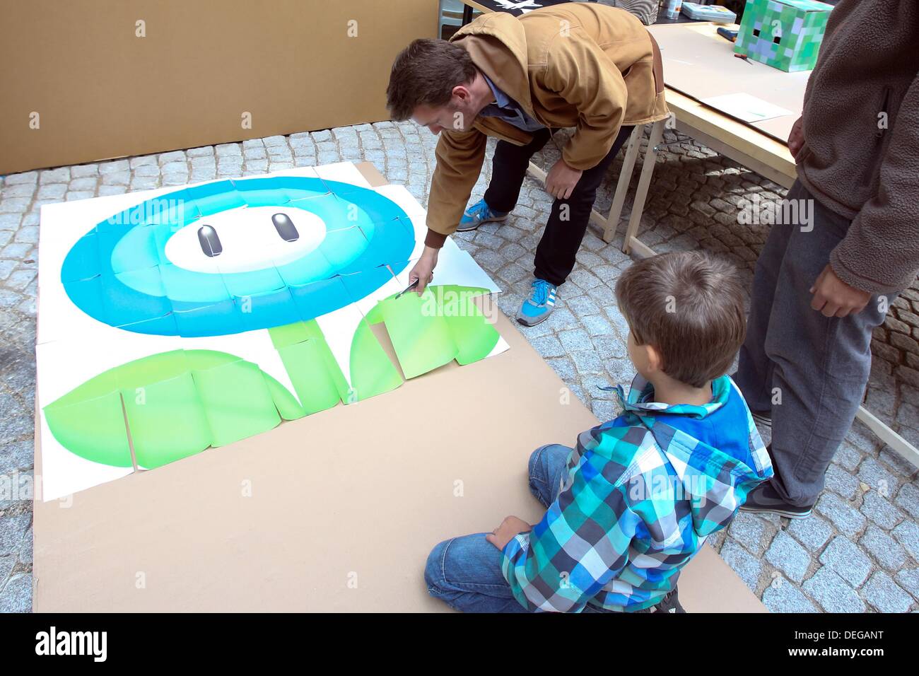 Participants create a flower from the computer game 'Super Mario' at a ...