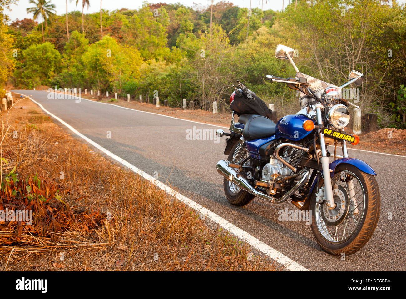 Motorcycle parked on the road, Panaji, Goa, India Stock Photo - Alamy