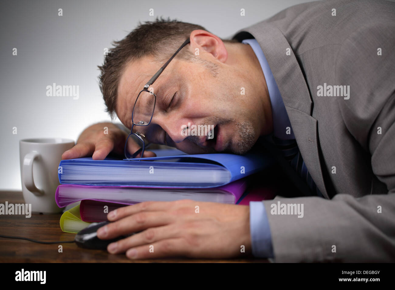 Sleeping worker working hi-res stock photography and images - Alamy