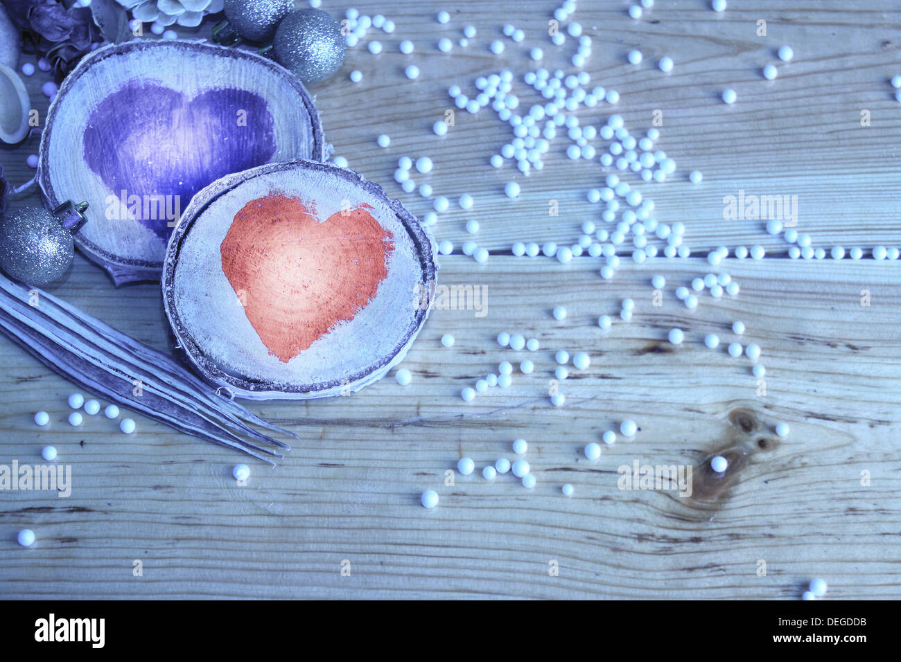 Two Christmas wooden hearts Stock Photo - Alamy