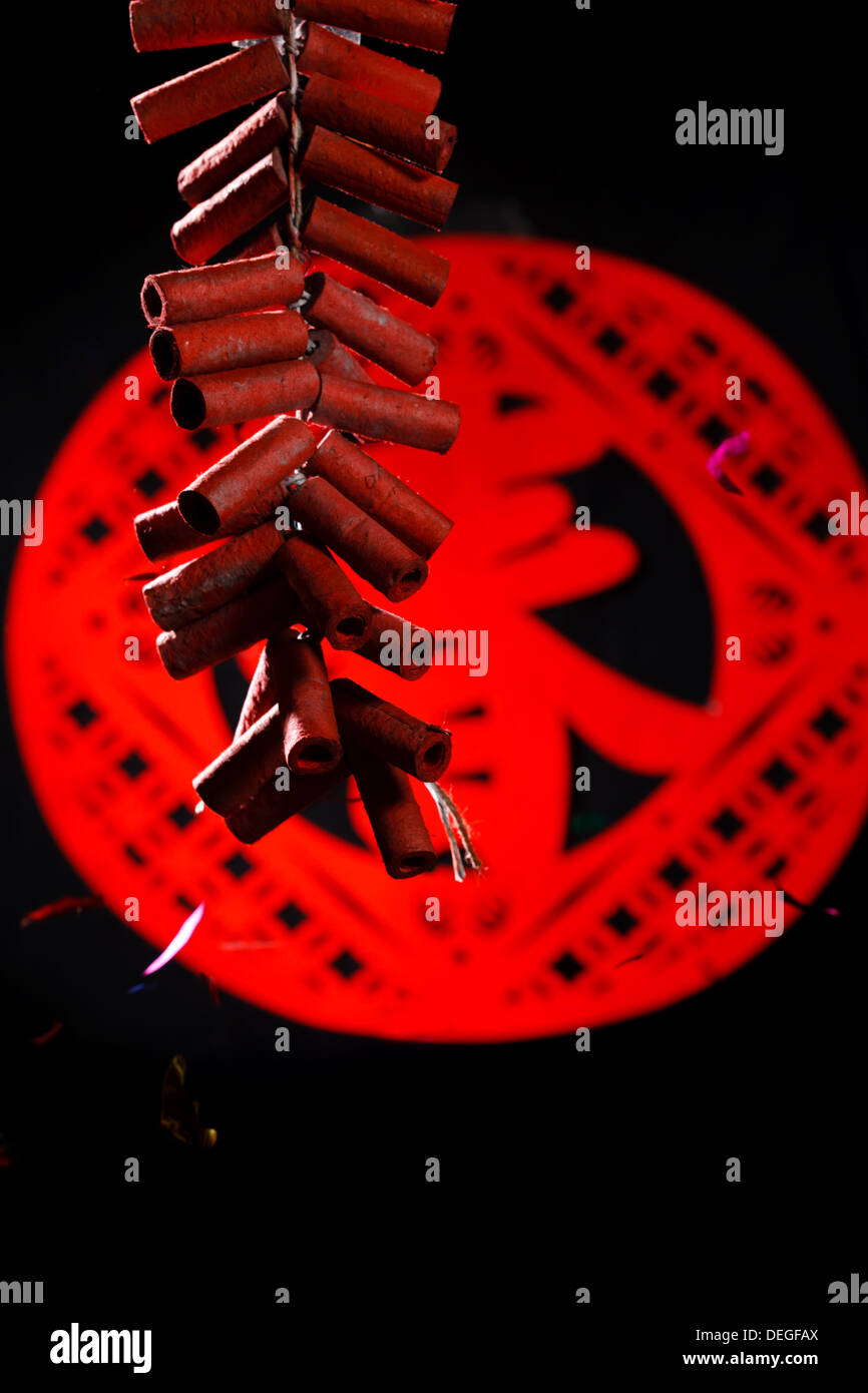 Spring character and firecracker Stock Photo - Alamy