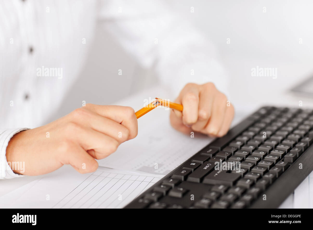 woman breaking pencil Stock Photo - Alamy