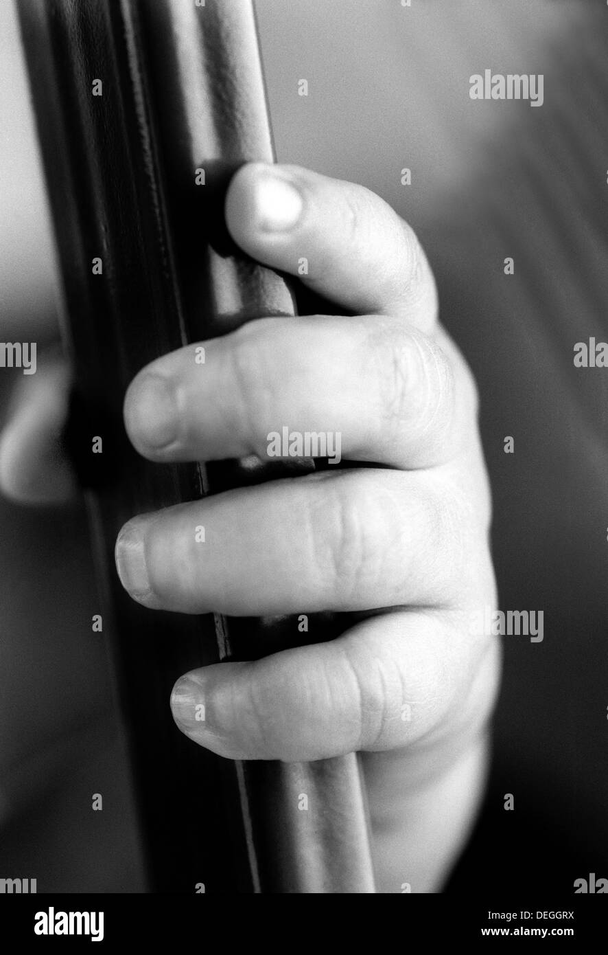 Hand gripping rail hi-res stock photography and images - Alamy