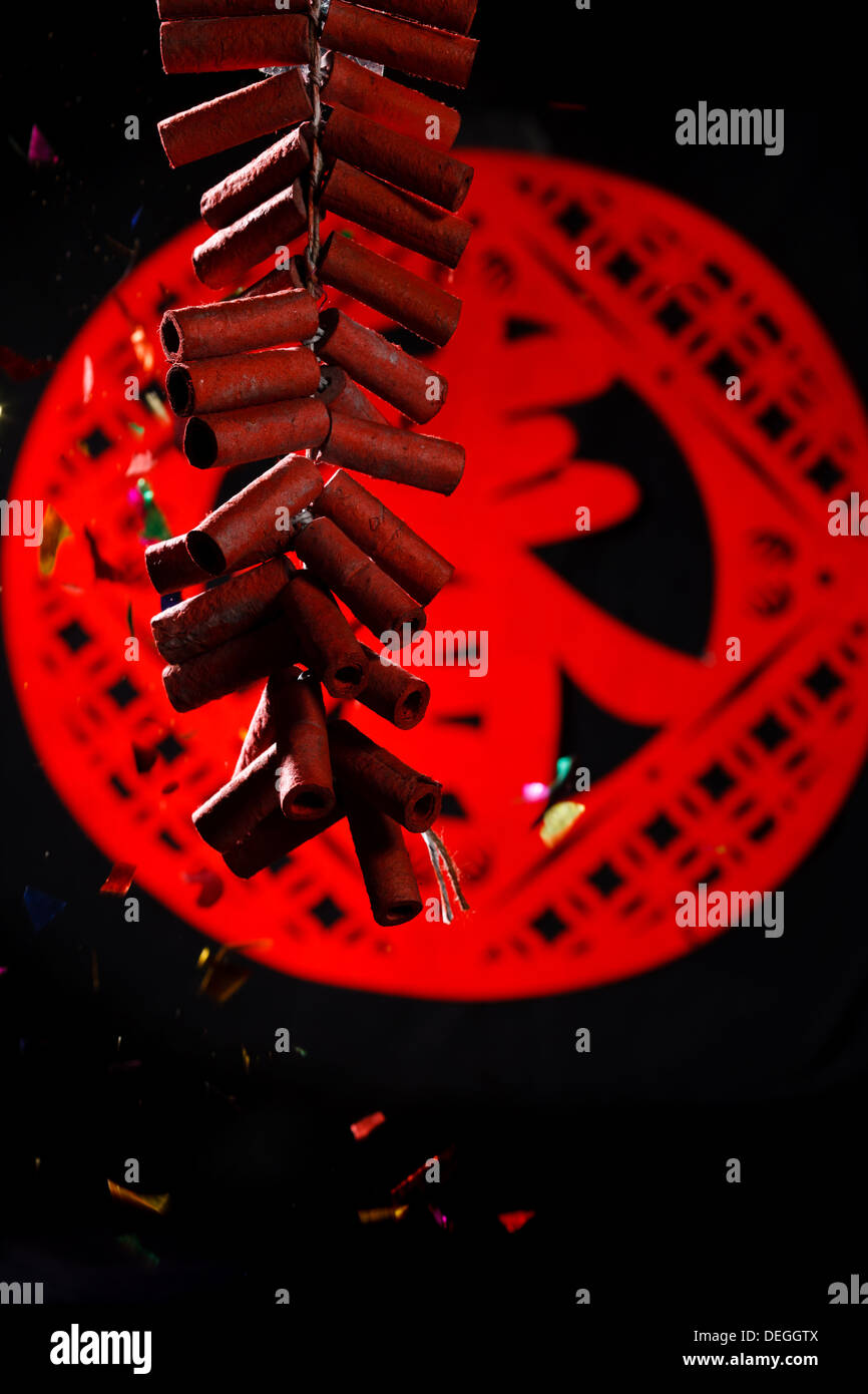 Spring character and firecracker Stock Photo - Alamy