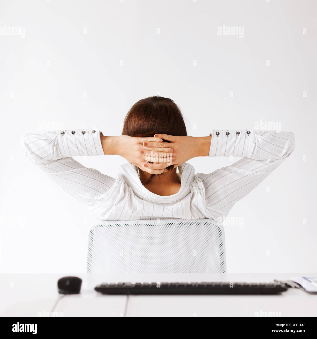 relaxed woman from the back with arms on head Stock Photo - Alamy