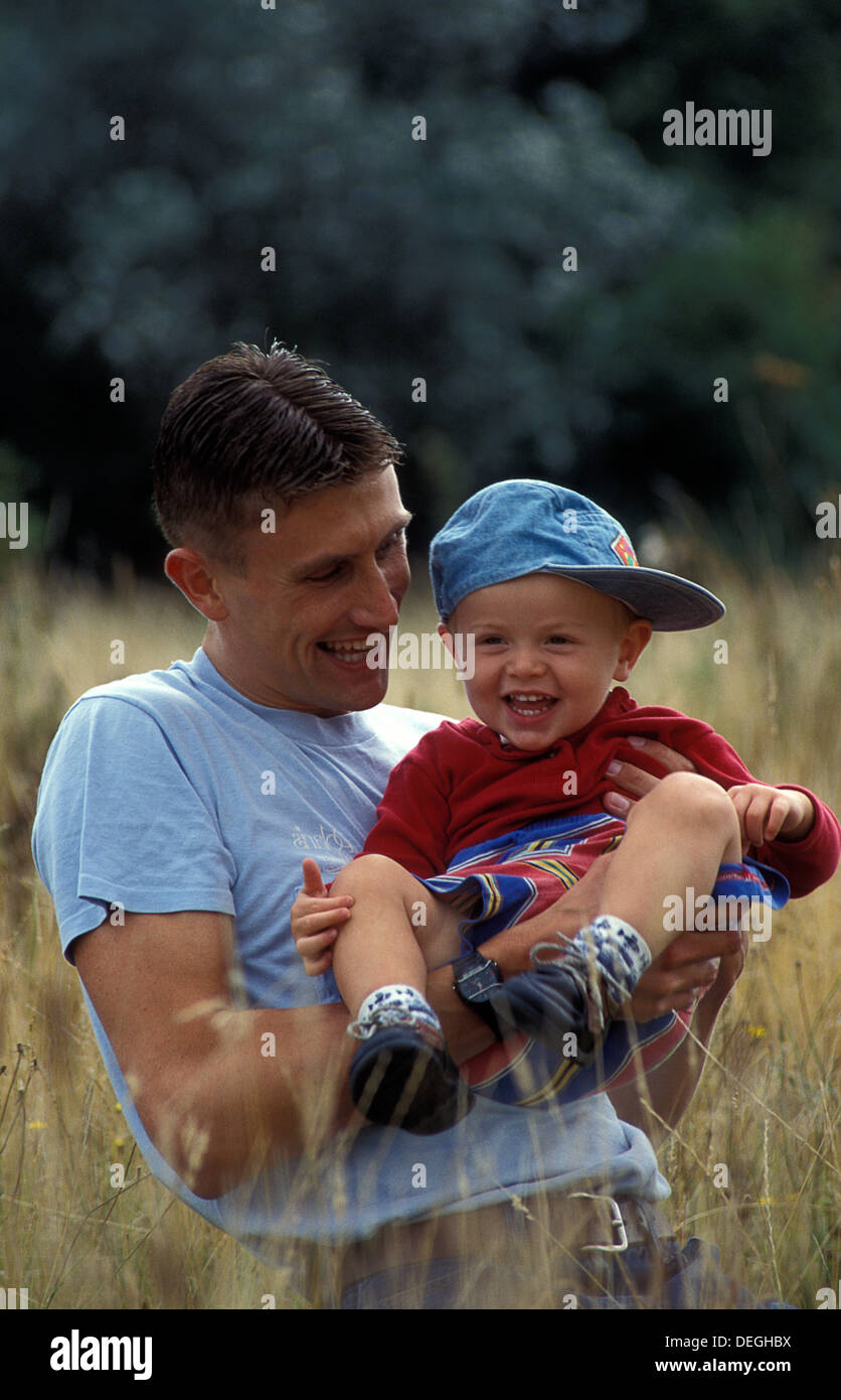 Father child playing outdoors hi-res stock photography and images - Alamy