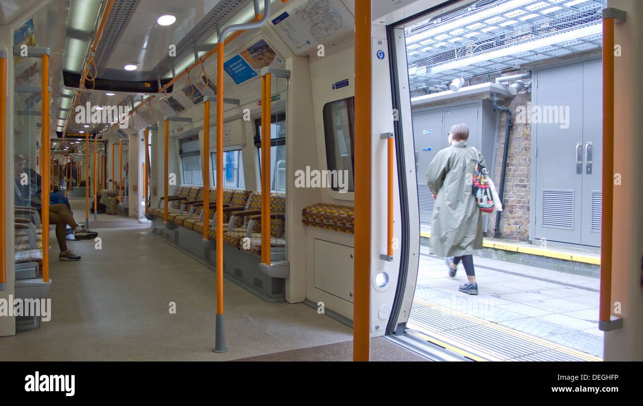 London overground train interior at station, door open Stock Photo - Alamy