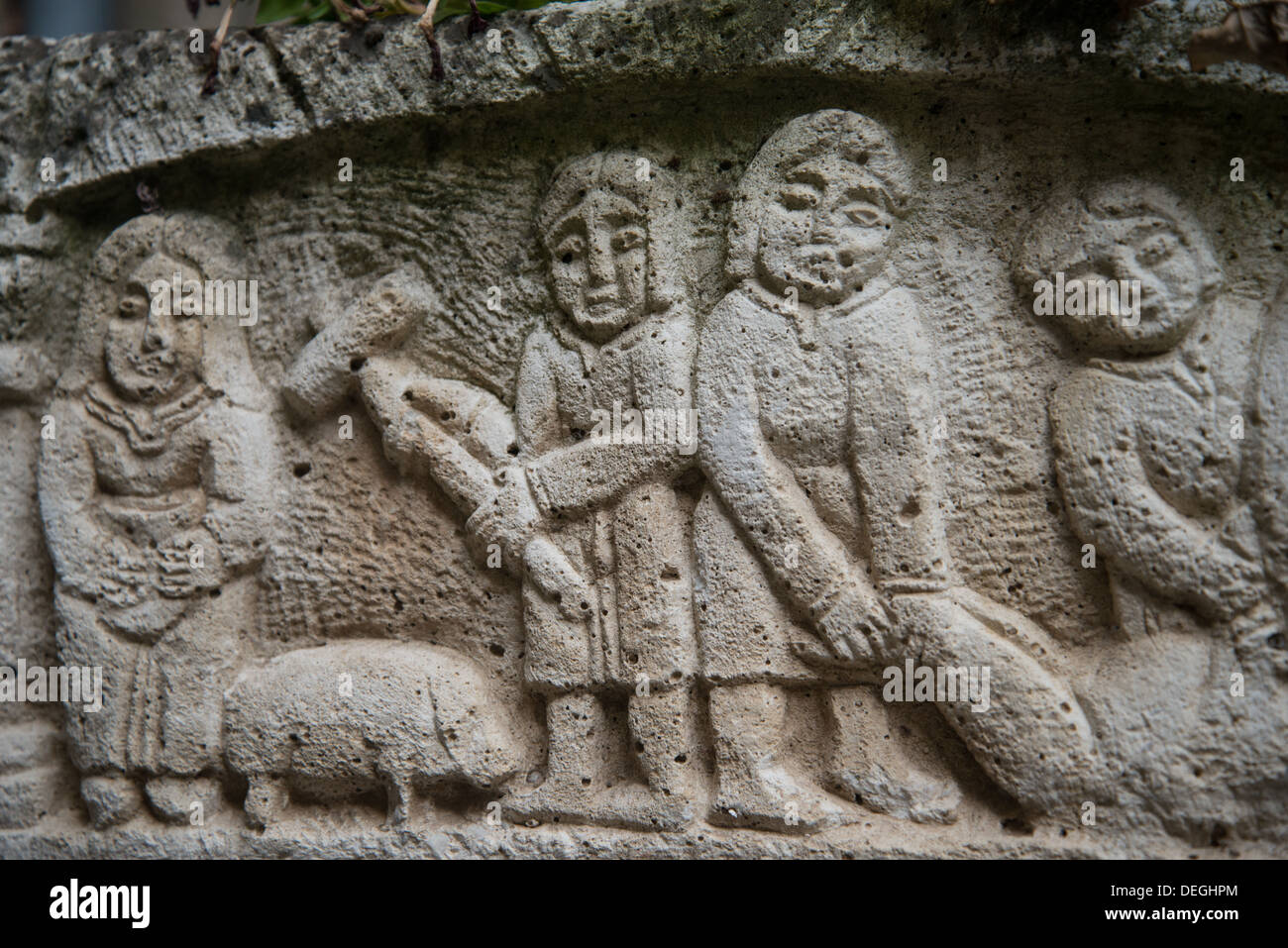 Medieval figures on stonework Stock Photo - Alamy