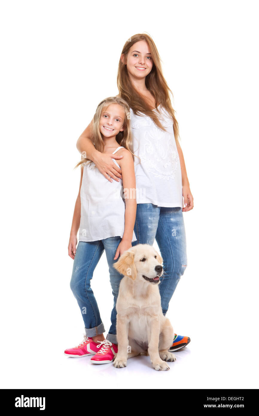 kids with golden labrador, retriever puppy Stock Photo - Alamy