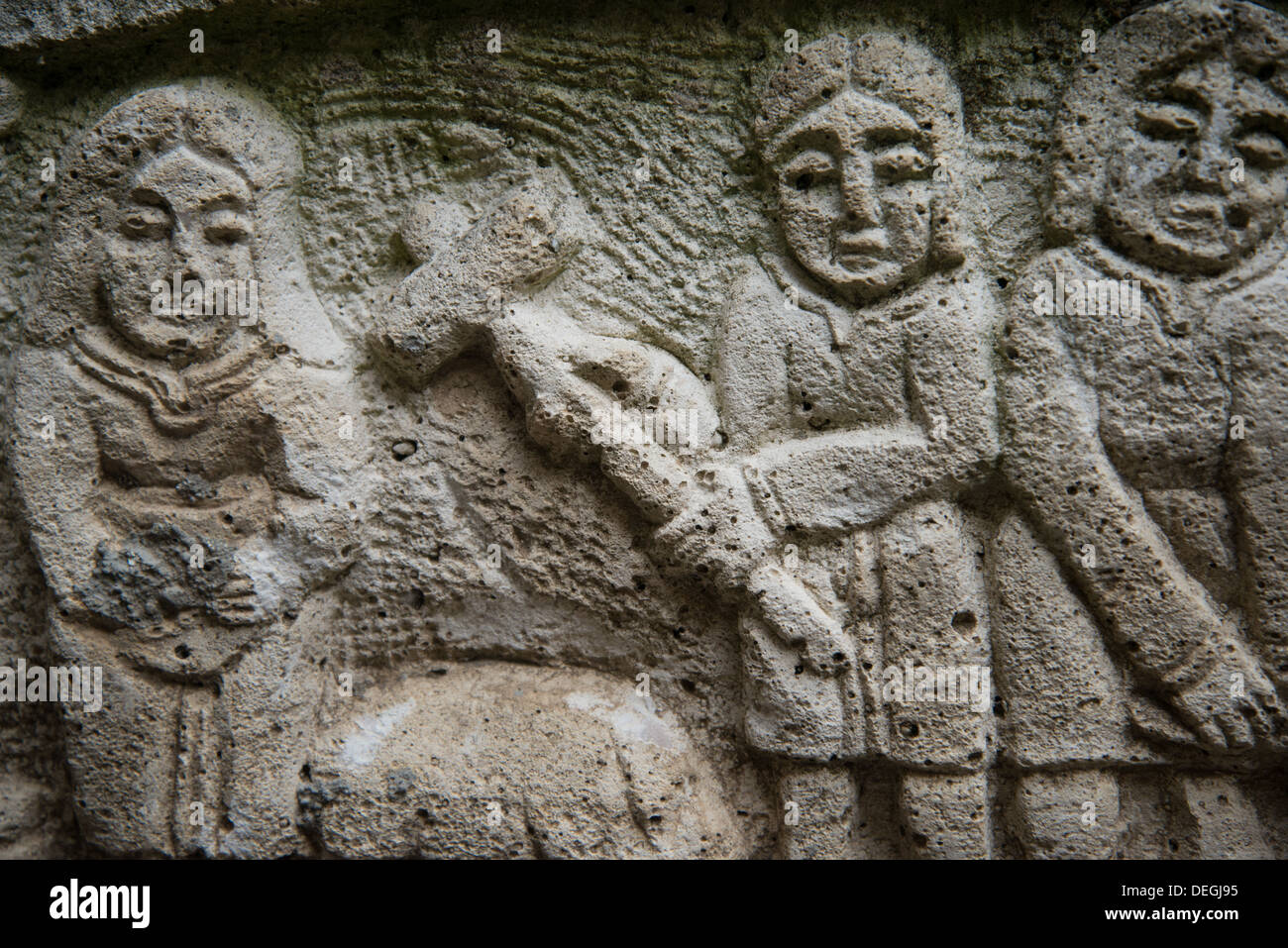 Medieval figures on stonework Stock Photo - Alamy