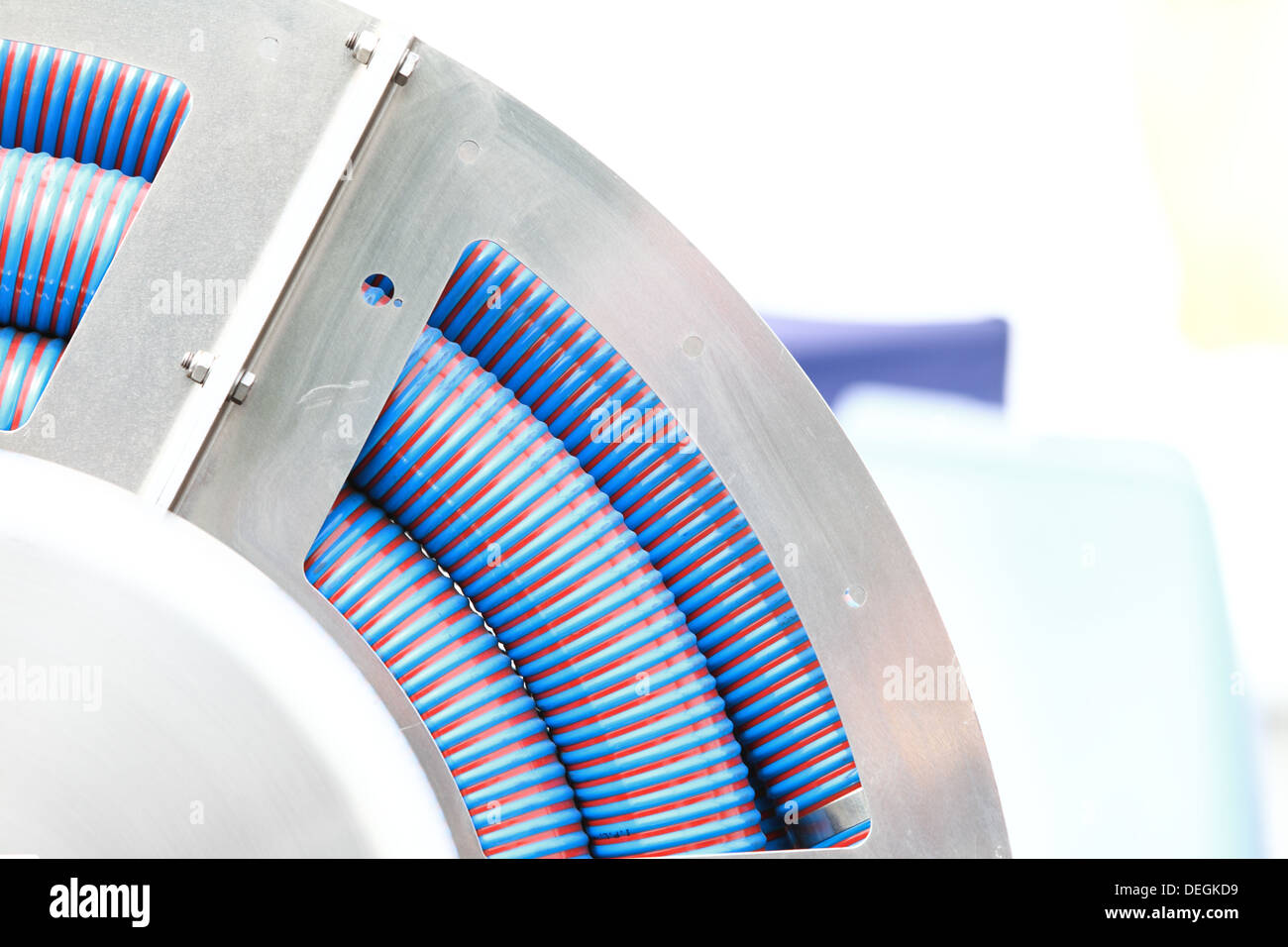 rolled up of blue plastic hose industrial detail Stock Photo - Alamy