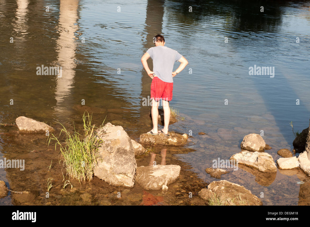 Man standing river hi-res stock photography and images - Alamy