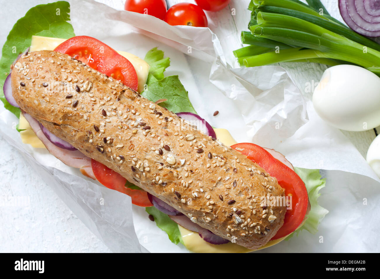 Sandwich on white paper abstract Stock Photo - Alamy