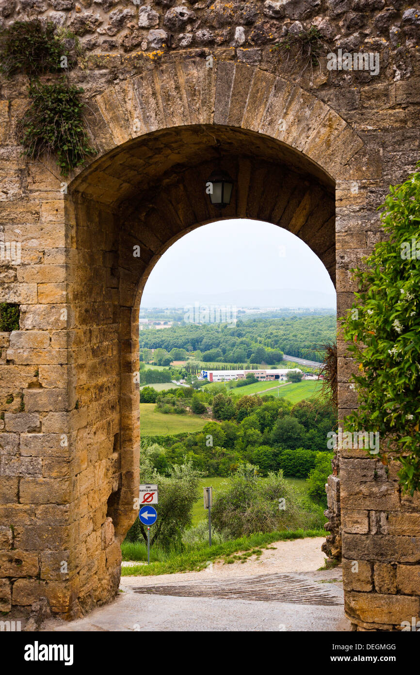 Landscape viewed through an archway, Monteriggioni, Siena Province ...