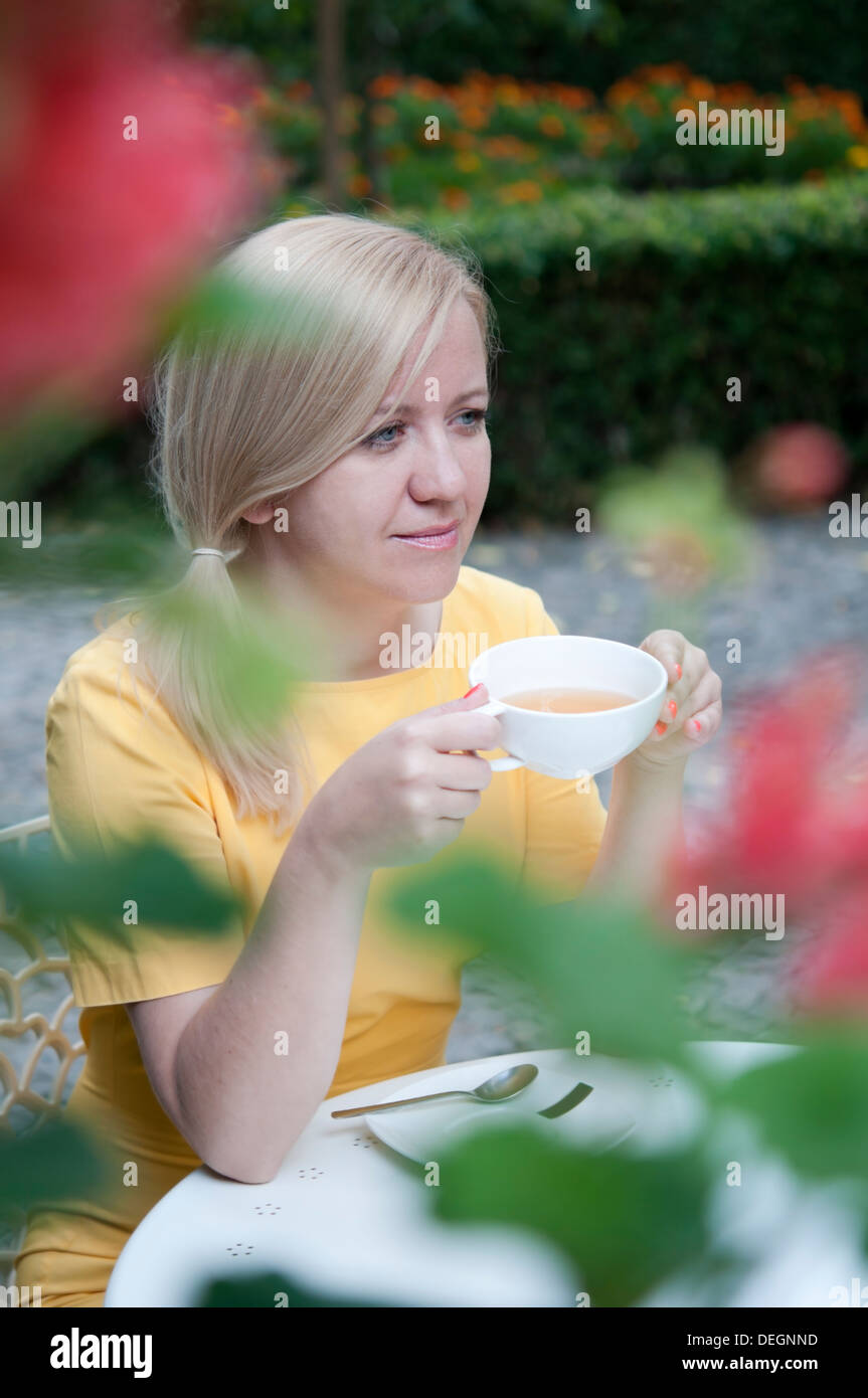 Female drinking tea hi-res stock photography and images - Alamy