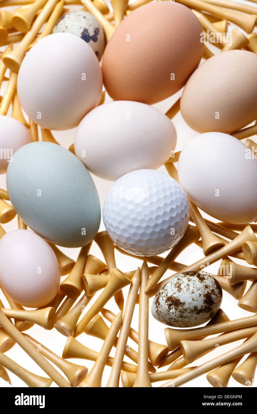 Eggs,golf ball and tees Stock Photo - Alamy