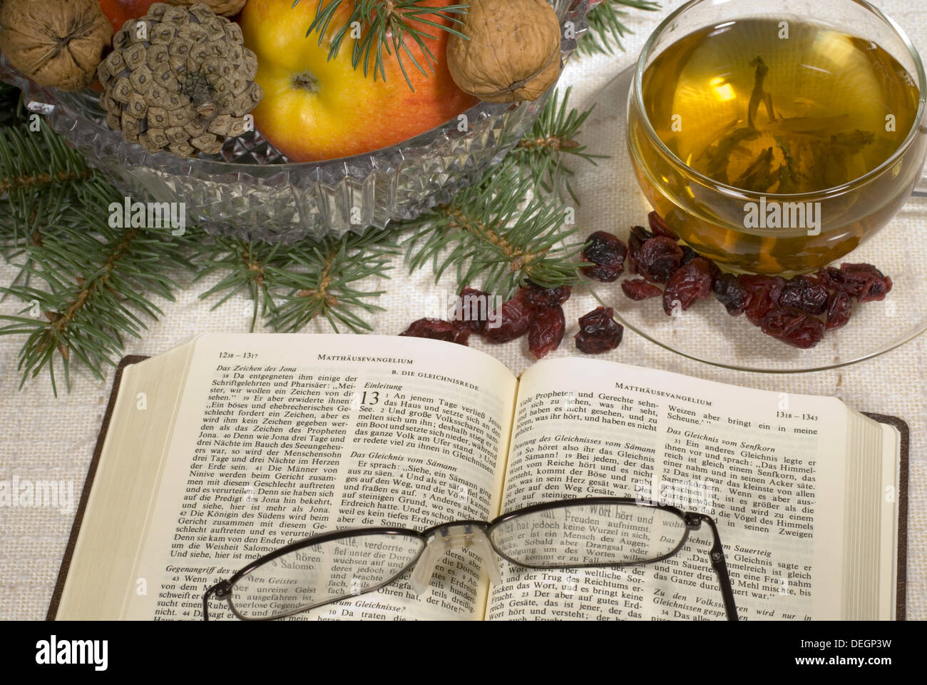 Christmas still life with bible and tea Stock Photo - Alamy