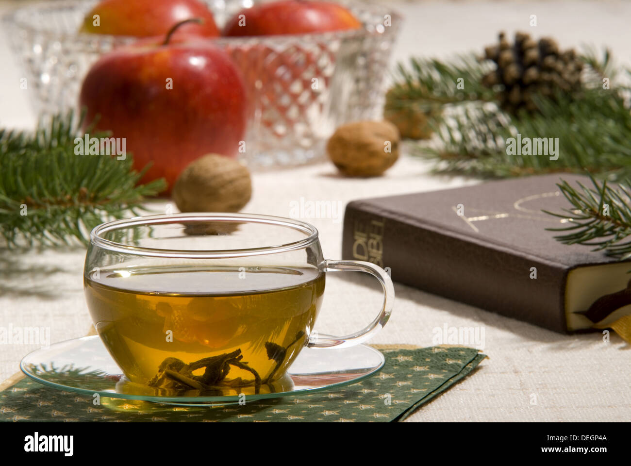 Christmas still life with bible and tea Stock Photo - Alamy