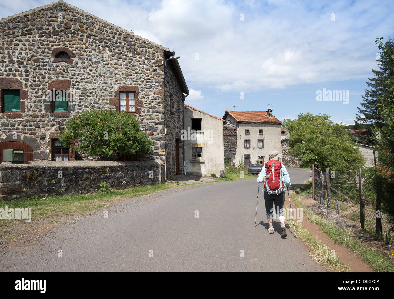 Pilgrim walking through Montbonnet on the GR65 walking route the Way of ...