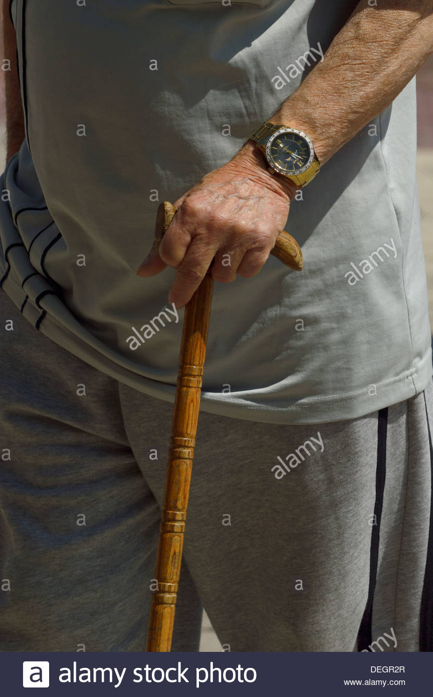 Elderly Man Holding Walking Stick High Resolution Stock Photography and ...