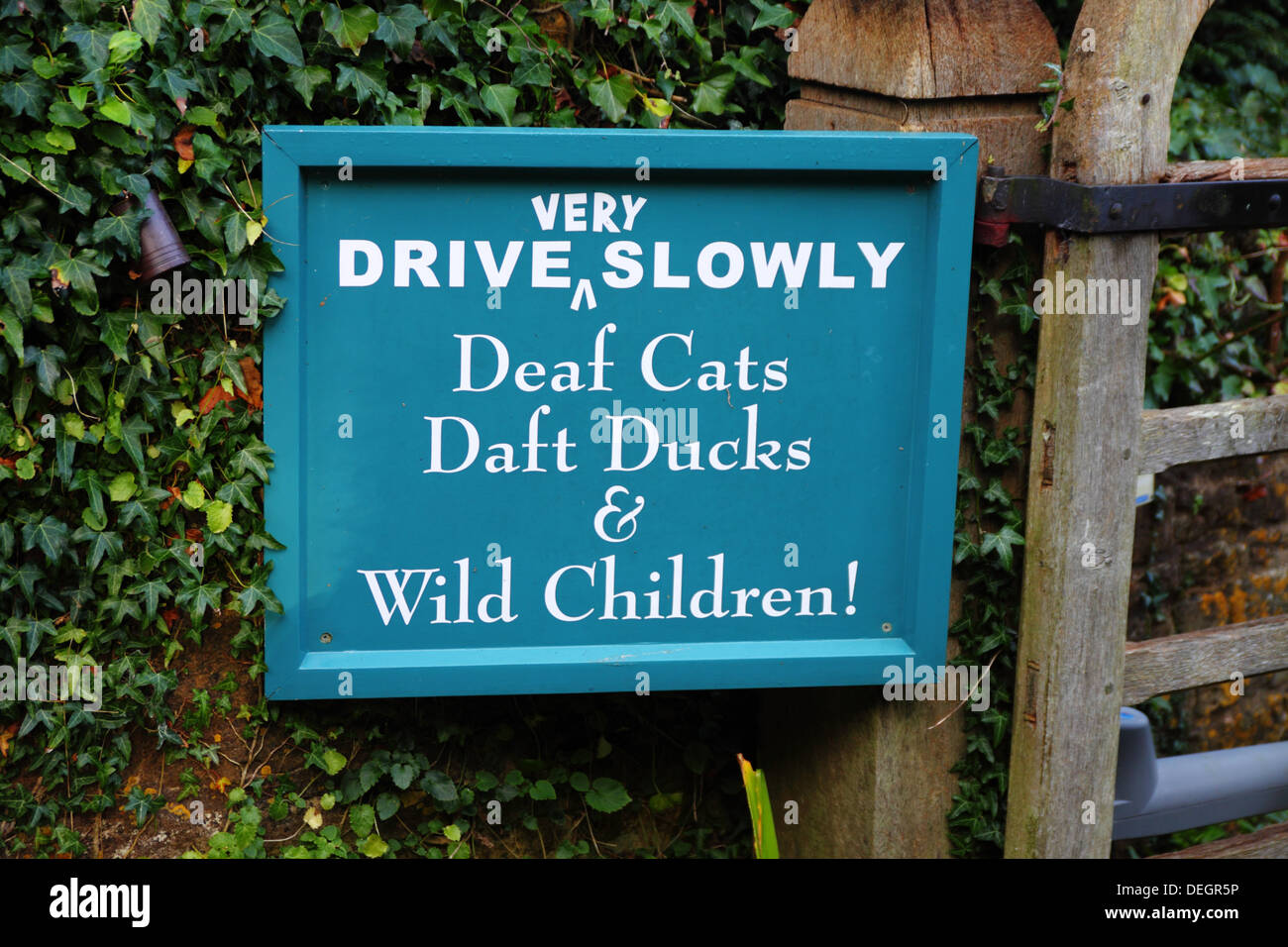 Silly warning sign in the Cotswolds Stock Photo - Alamy