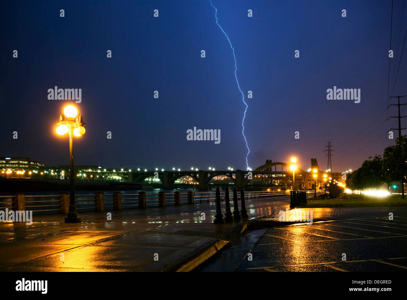Lightning strike over the Mississippi river and bridges, downtown ...