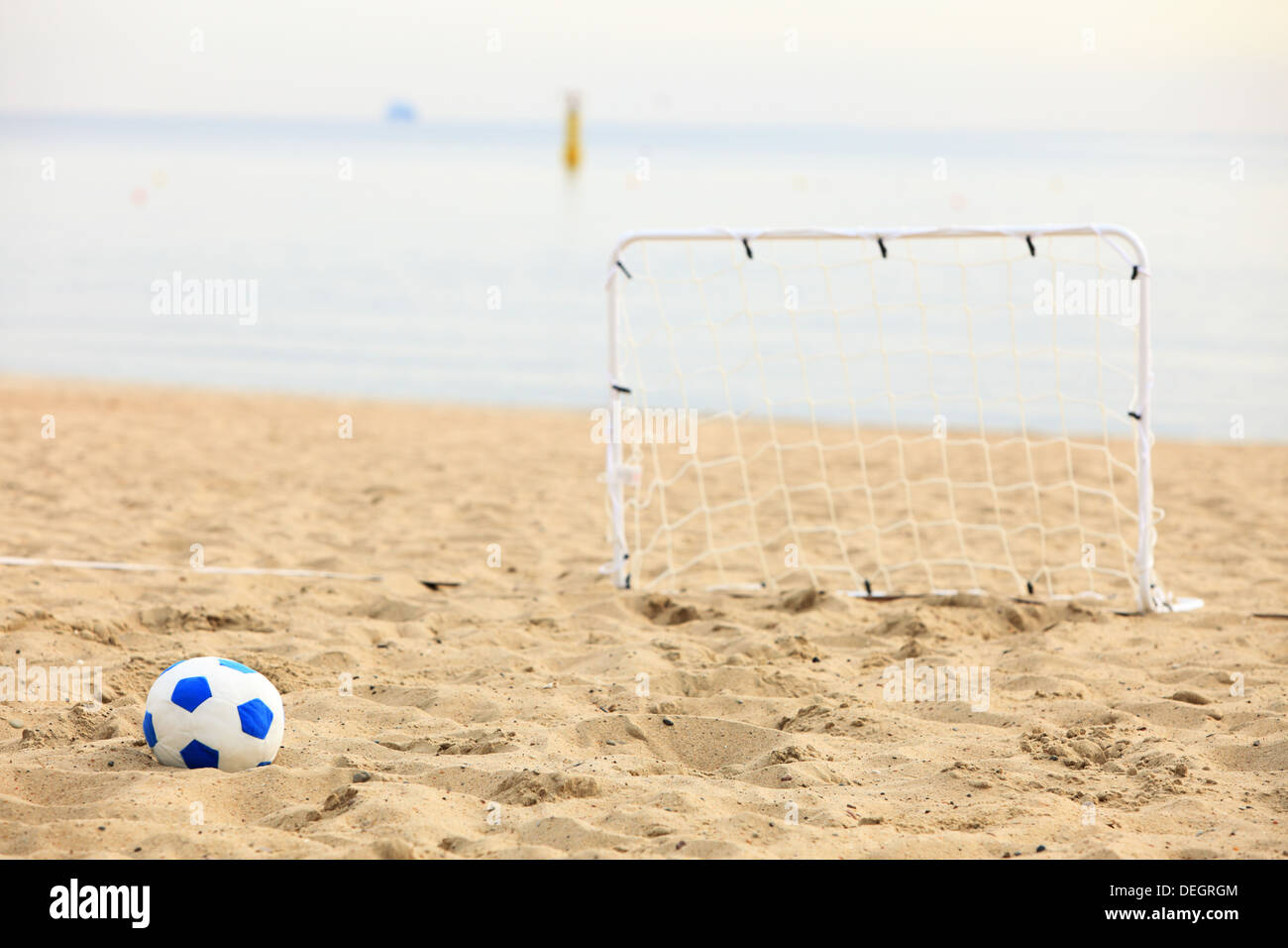 football gate and ball, beach soccer goal Stock Photo - Alamy