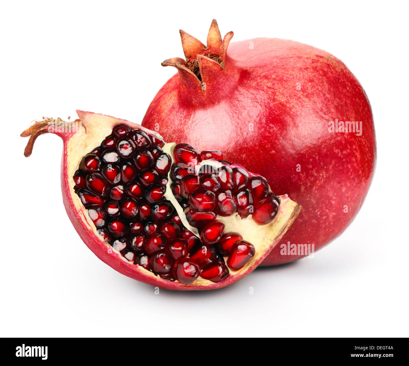 Section of pomegranate isolated on white background Stock Photo - Alamy