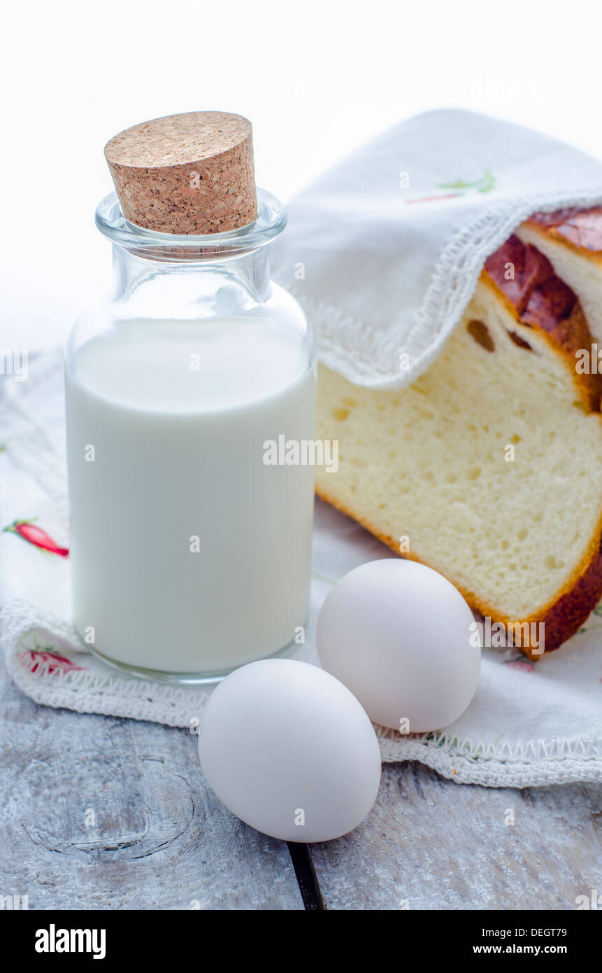 fresh milk, eggs and buns for breakfast Stock Photo - Alamy
