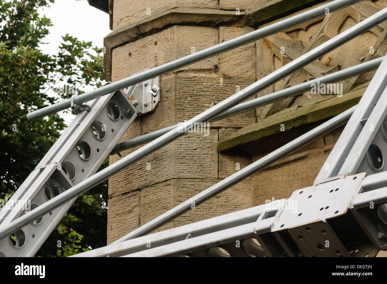 Steel support holding up a leaning wall to prevent it falling Stock ...