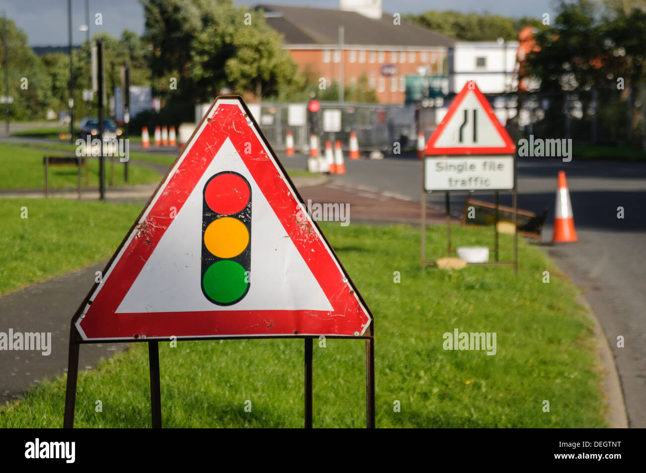 Traffic lights warning sign at a set of roadworks Stock Photo - Alamy