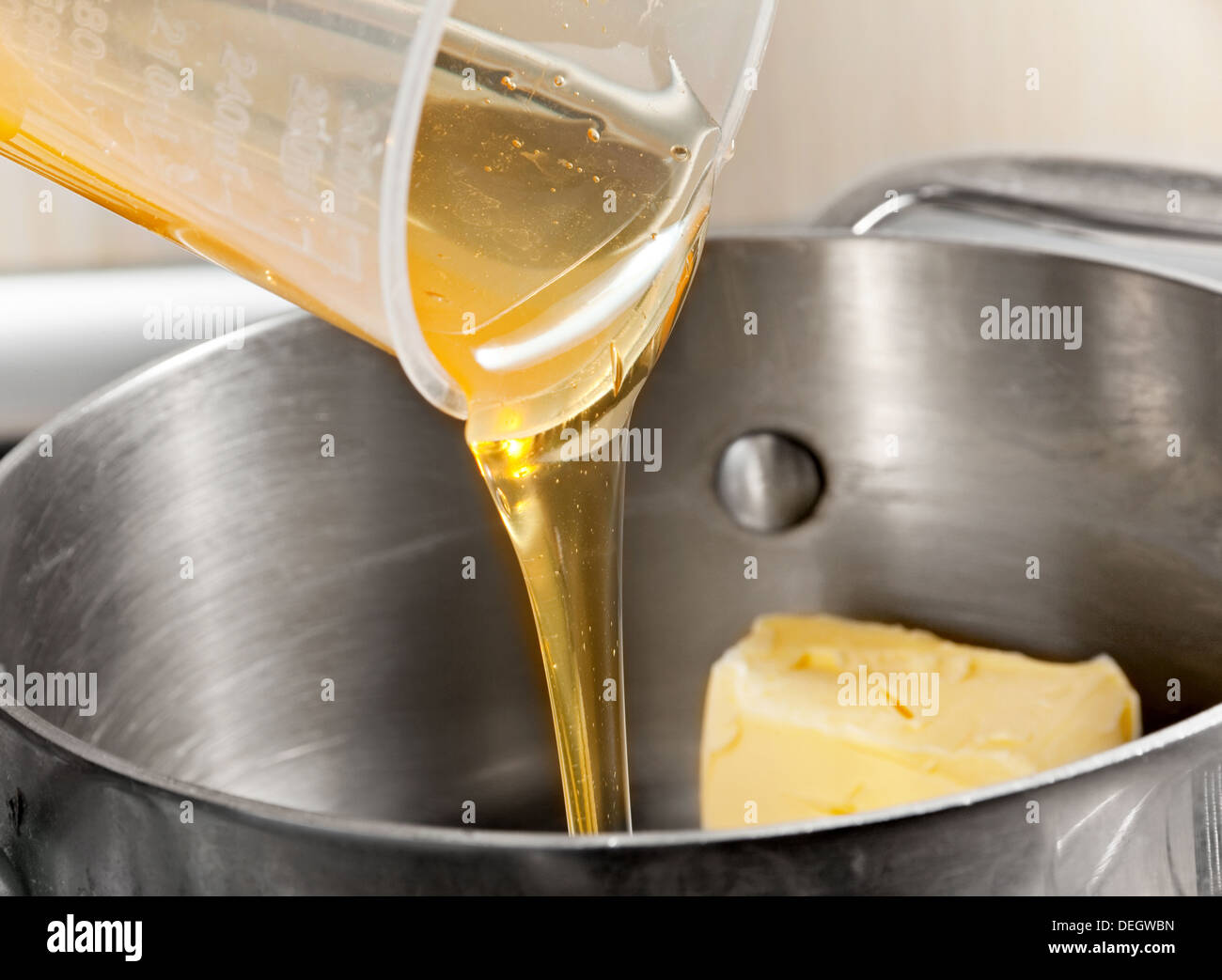 Add honey hi-res stock photography and images - Alamy