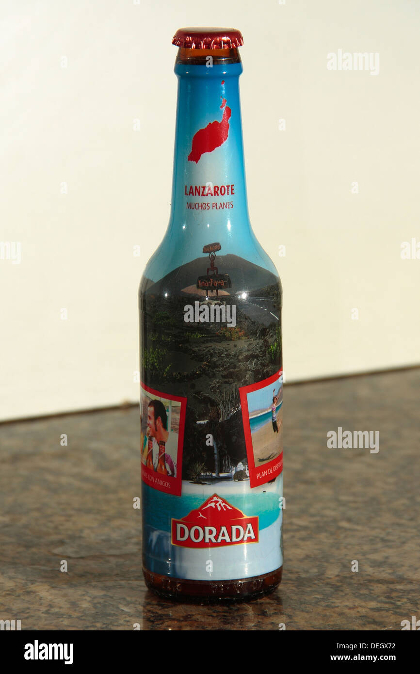 A promotional bottle of Dorada beer, with scenes from Lanzarote in ...