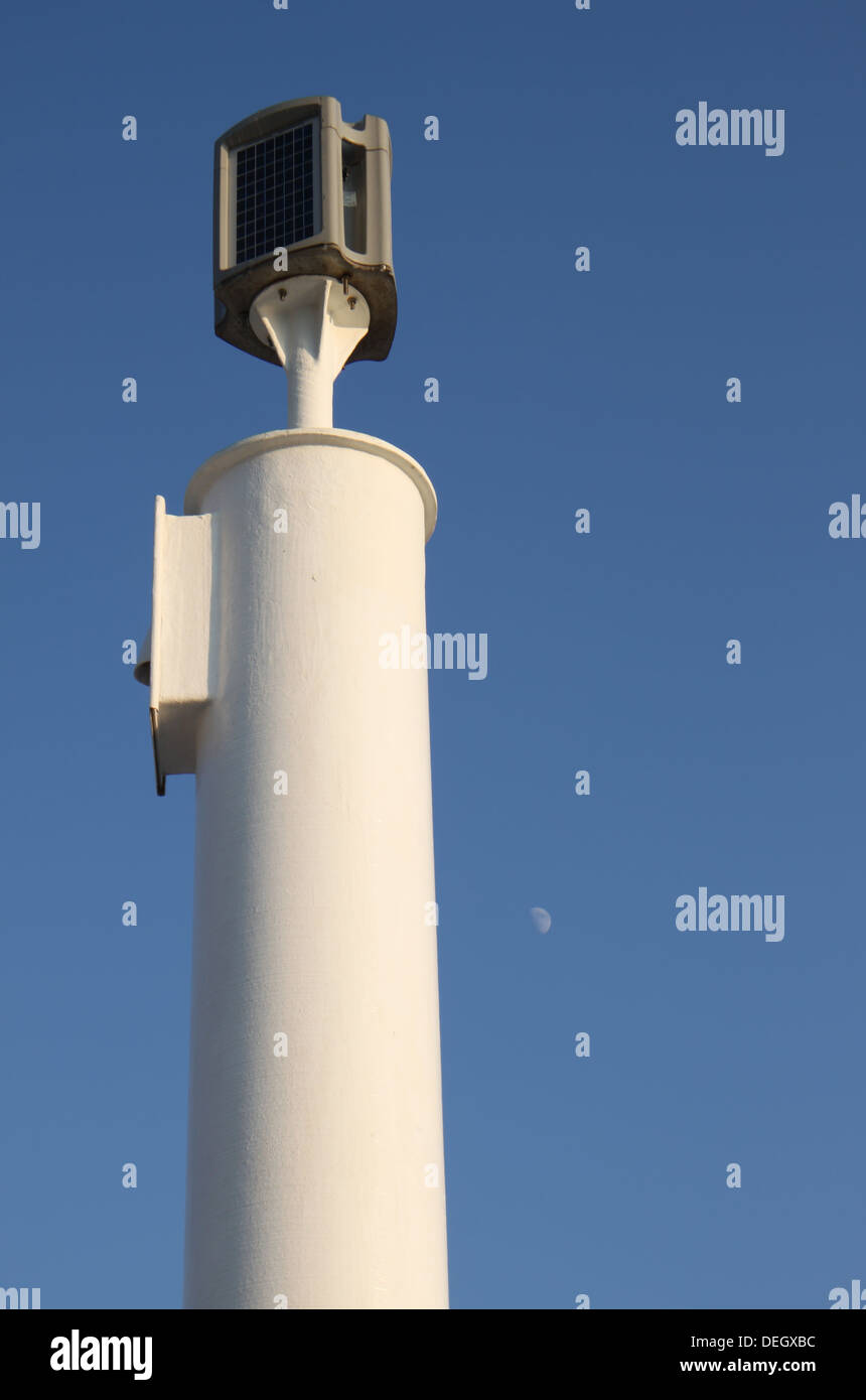 Port beacon and moon behind it represent two most important beacons for ...